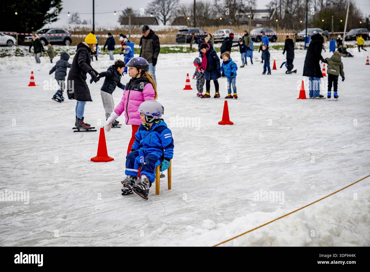 BOSKOOP - People are skating on the natural ice rink. Skating is ...