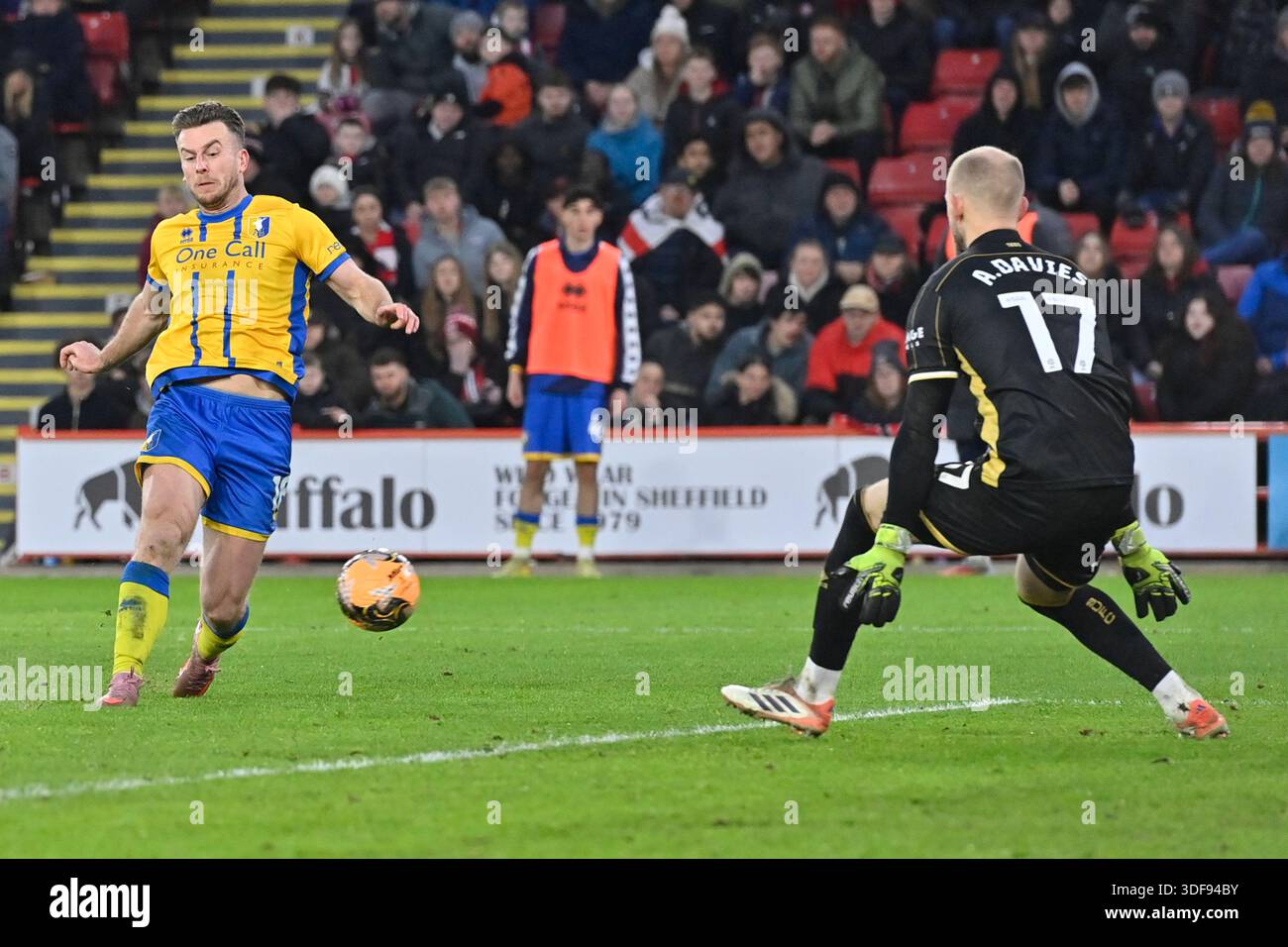 Rhys Oates of Mansfield Town scores to make it 4-1 during the Sheffield ...