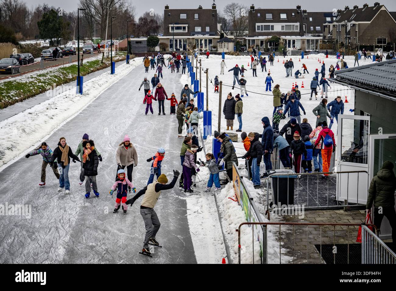 BOSKOOP - People are skating on the natural ice rink. Skating is ...