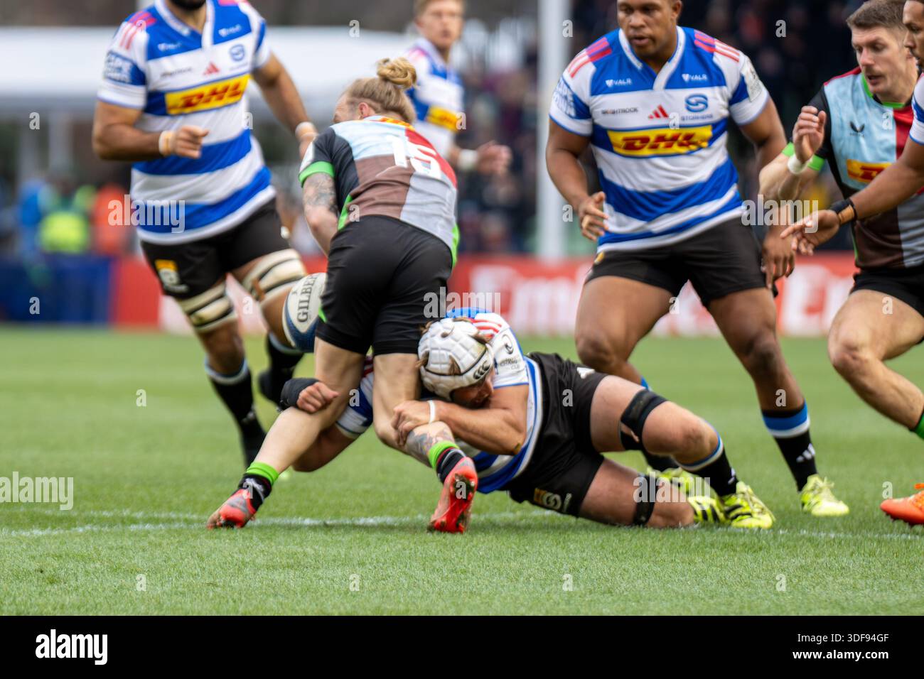 Louw Nel (6 Stormers) stops Tyrone Green (15 Harlequins) with a low ...