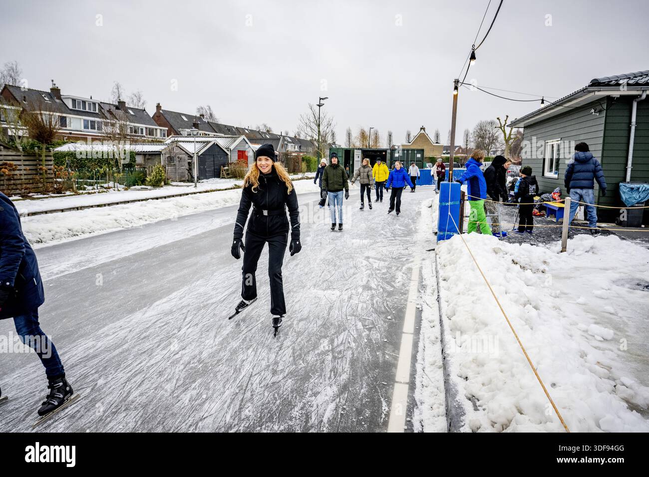 BOSKOOP - People are skating on the natural ice rink. Skating is ...