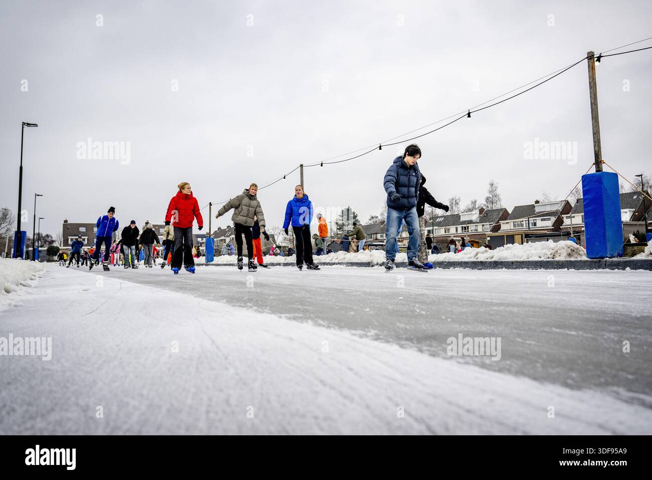 BOSKOOP - People are skating on the natural ice rink. Skating is ...