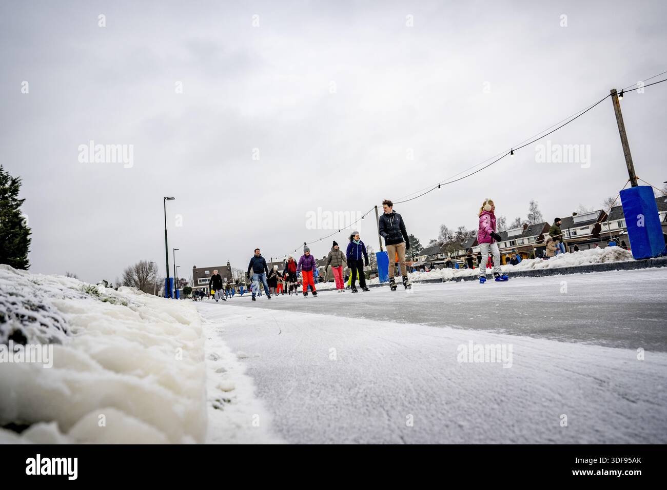 BOSKOOP - People are skating on the natural ice rink. Skating is ...