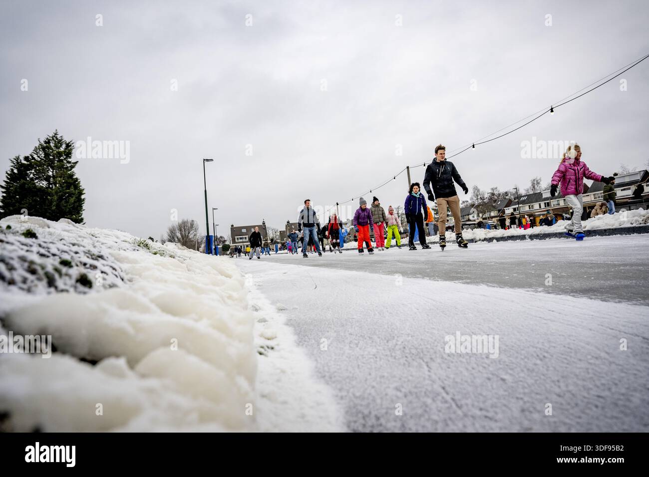 BOSKOOP - People are skating on the natural ice rink. Skating is ...