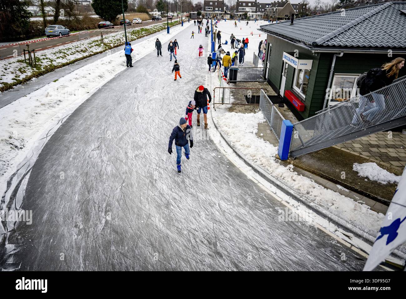 BOSKOOP - People are skating on the natural ice rink. Skating is ...