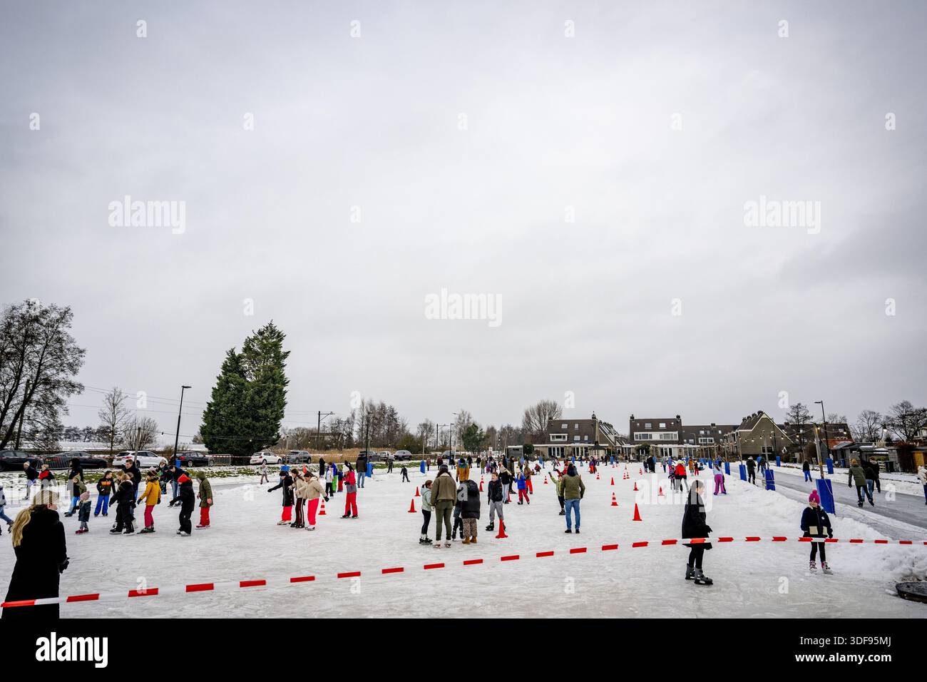 BOSKOOP - People are skating on the natural ice rink. Skating is ...