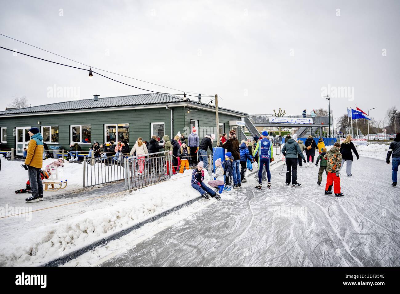 BOSKOOP - People are skating on the natural ice rink. Skating is ...