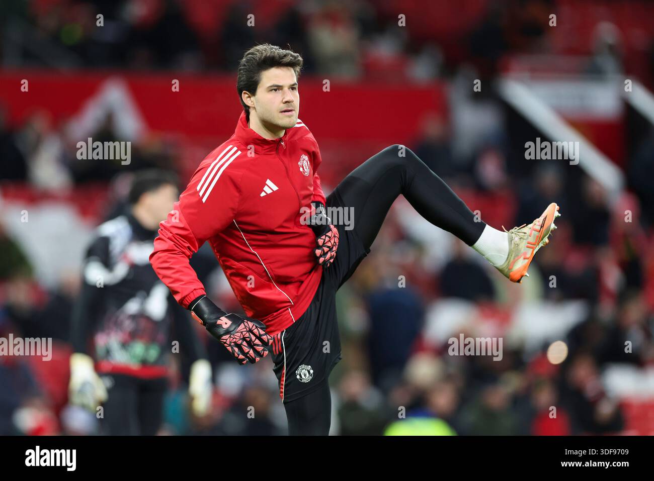 Manchester United goalkeeper Senne Lammens (31) warms up during the ...