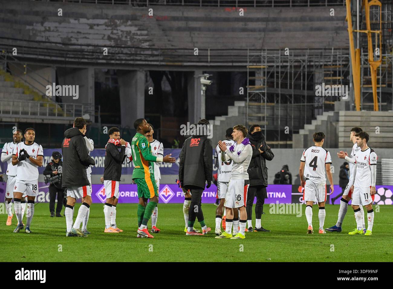 Florence, Italy. 11th Jan, 2026. Milan players greet their fans during ...
