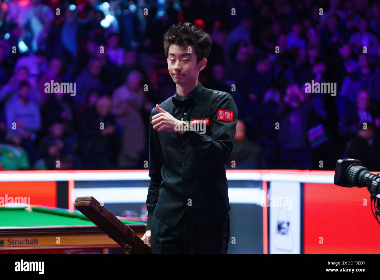 Wu Yize celebrating after winning the round one match between Shaun ...