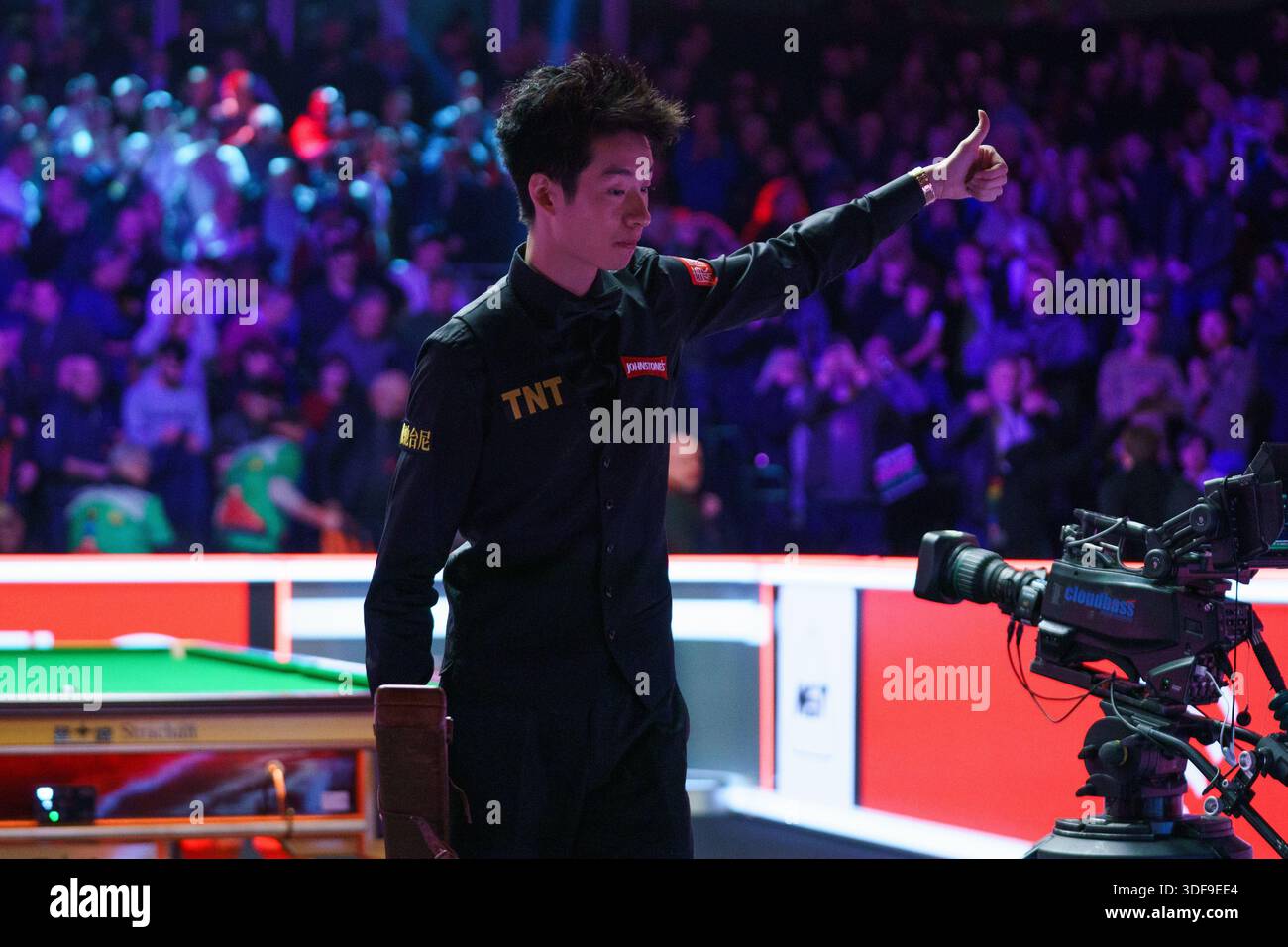 Wu Yize celebrating after winning the round one match between Shaun ...