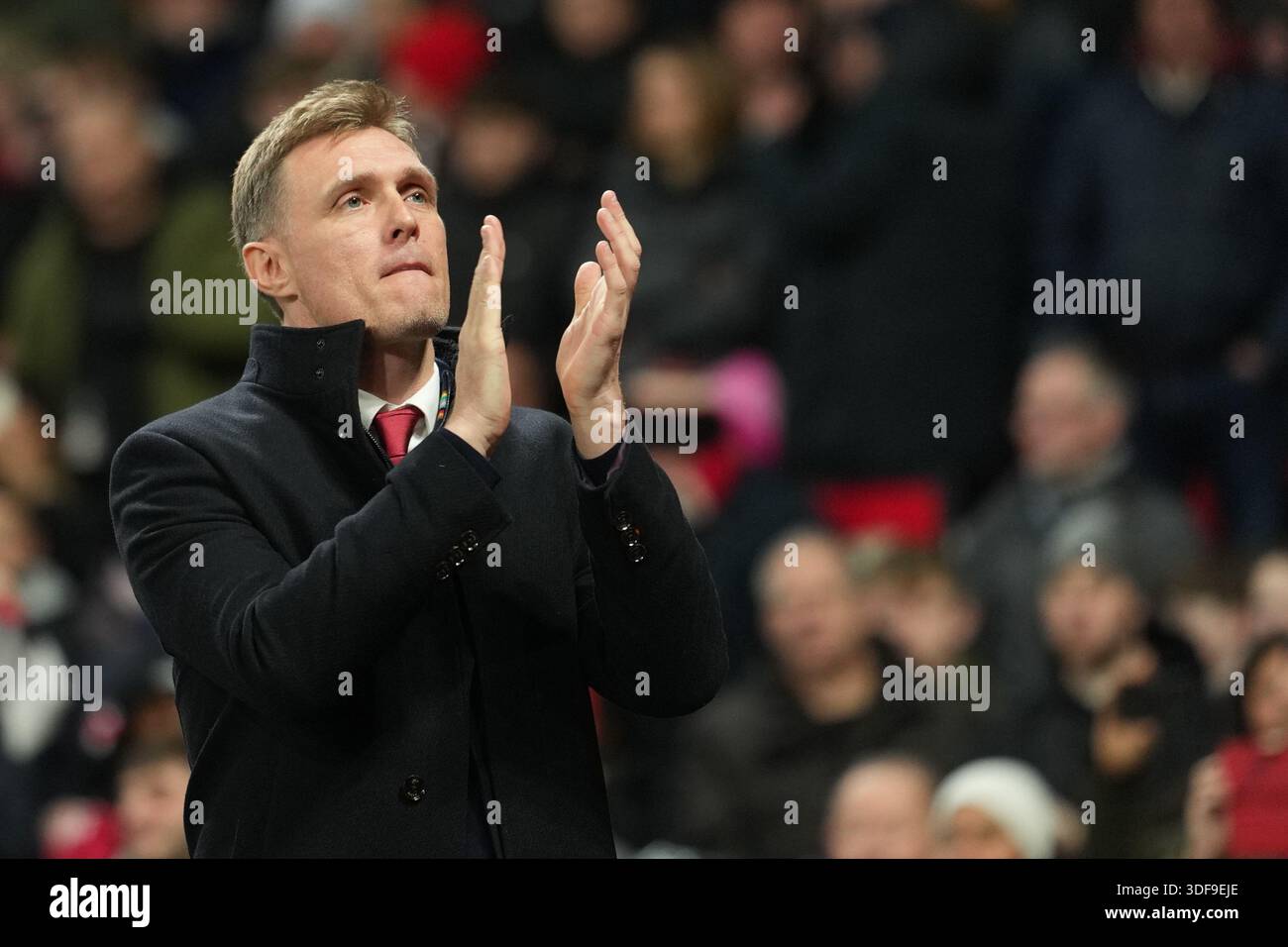 Manchester United's interim manager Darren Fletcher greets the fans ...