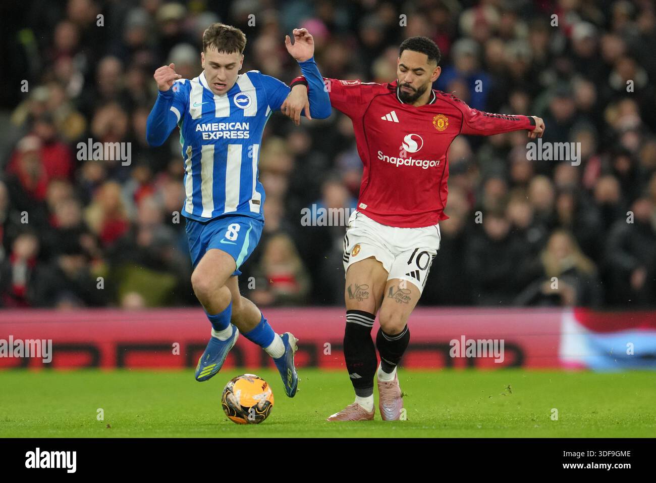 Brighton's Brajan Gruda, left, and Manchester United's Matheus Cunha ...
