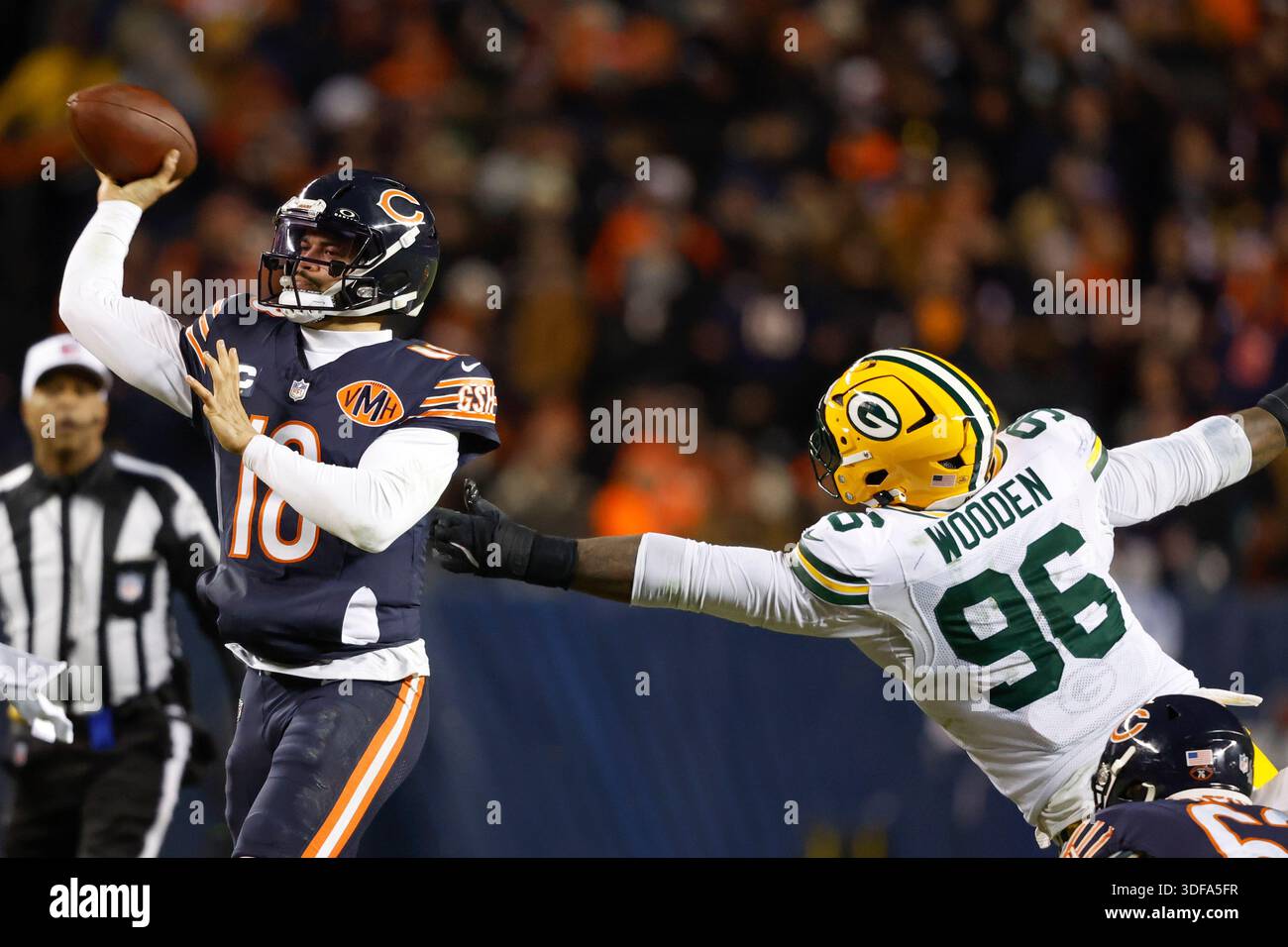 Chicago Bears quarterback Caleb Williams (18) throws during an NFL wild ...