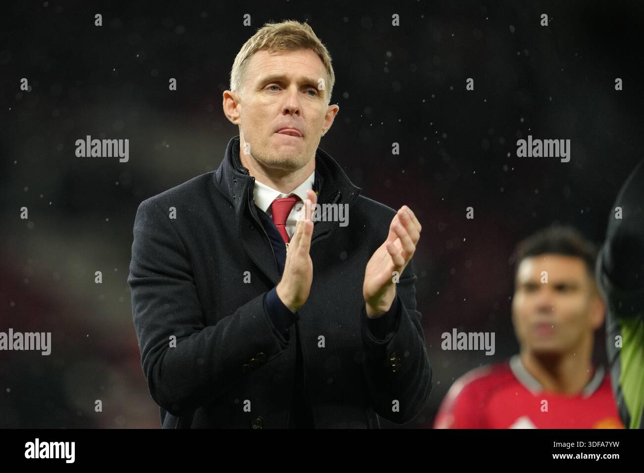 Manchester United's interim manager Darren Fletcher walks off the pitch ...