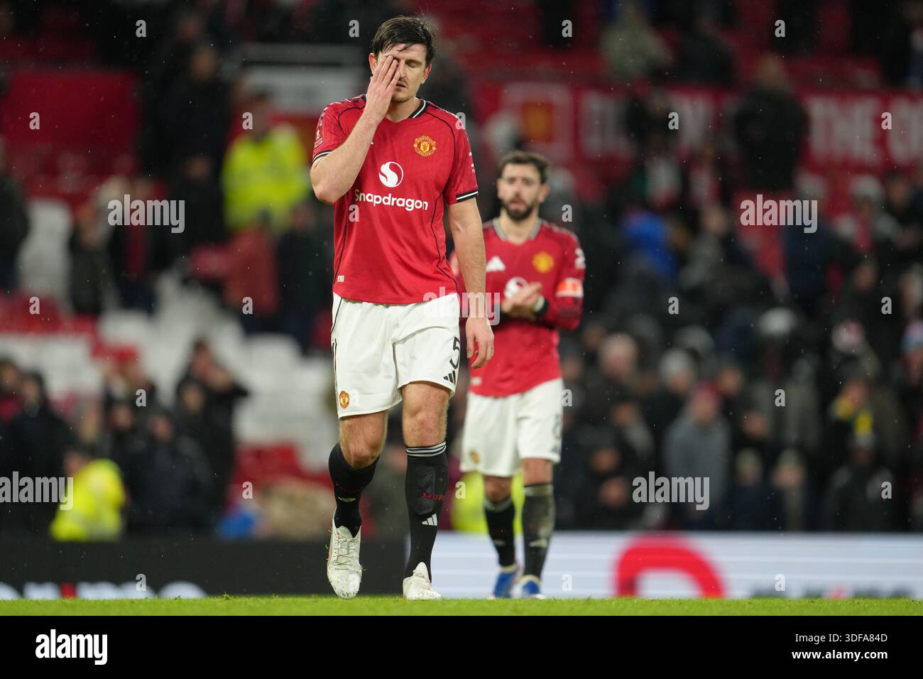 Manchester United's Harry Maguire walks off the pitch after the FA Cup ...