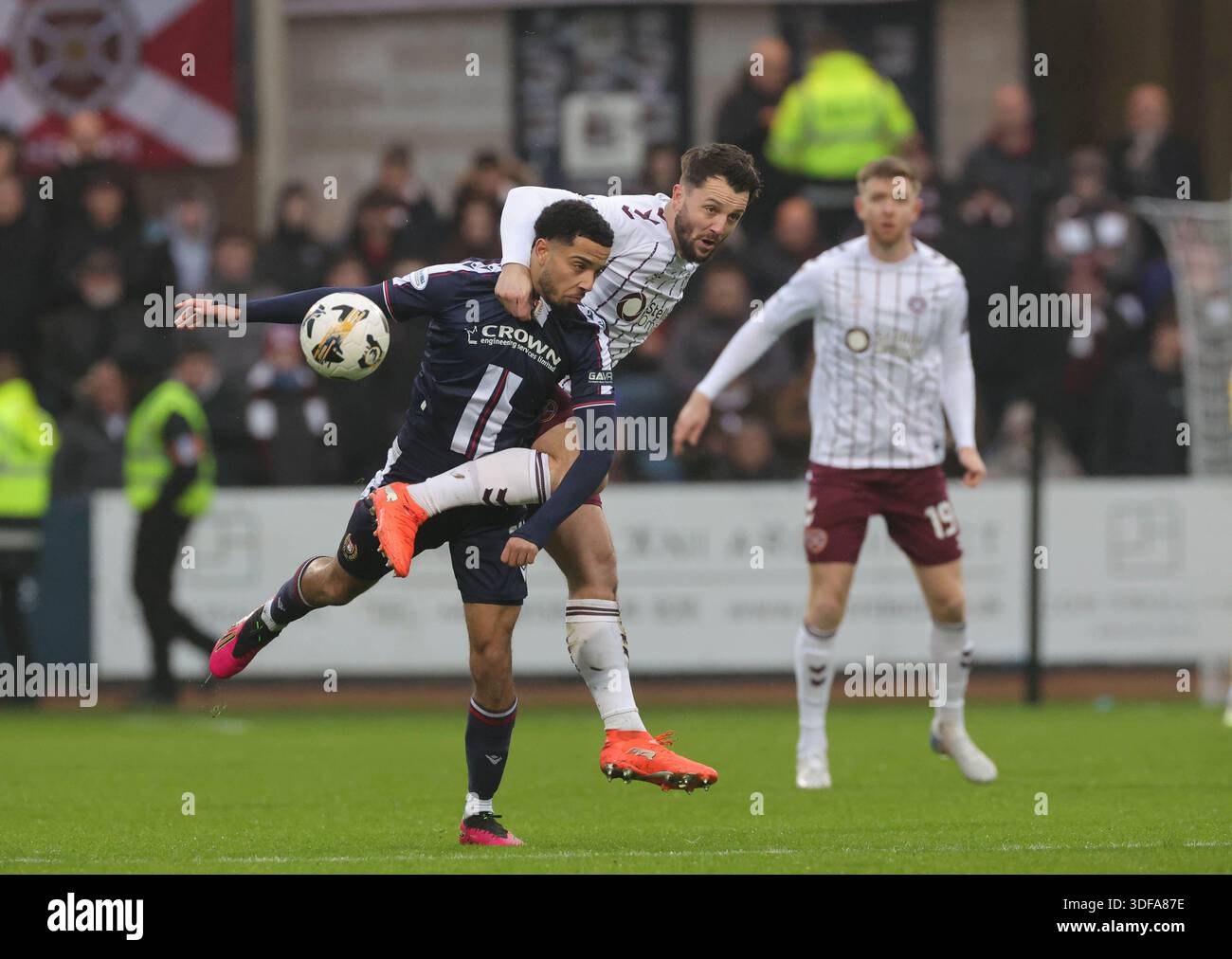 Dundee's Ashley Hay (left) and Heart of Midlothian's Craig Halkett ...