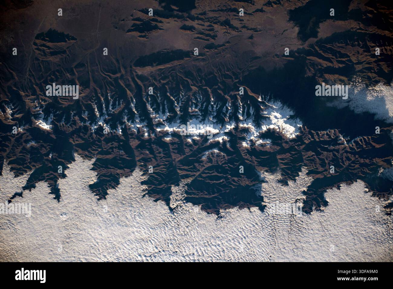 Andes Mountain Chain, South America. Snow-capped mountain tops are ...