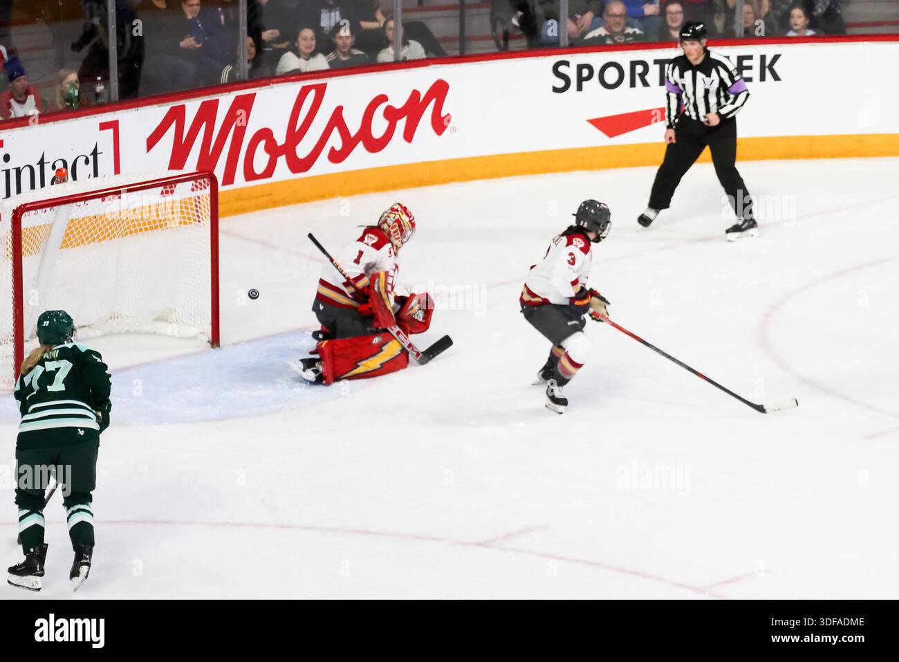 A puck hits the Ottawa Charge goal post in the second period of the ...