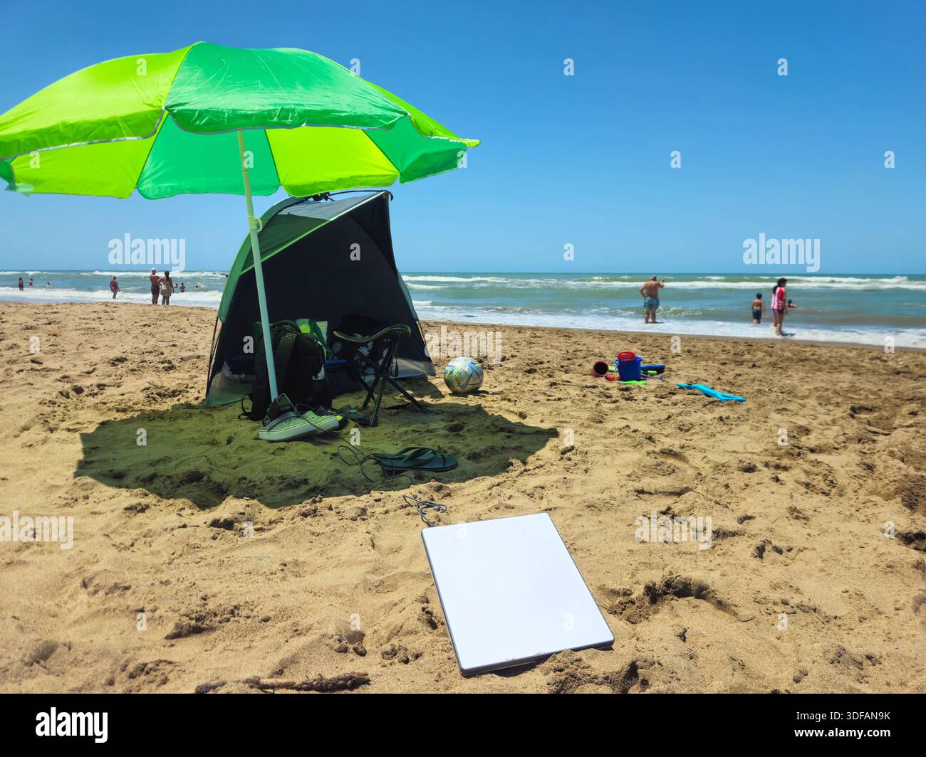 Starlink antenna on the beach during the day. Remote communication ...