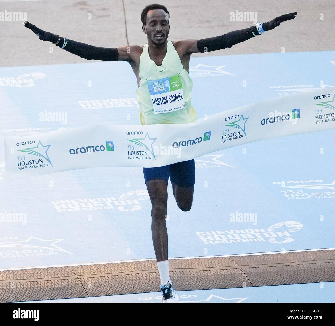 Habtom Samuel, of Ethiopia, breaks the Houston Half Marathon record as ...