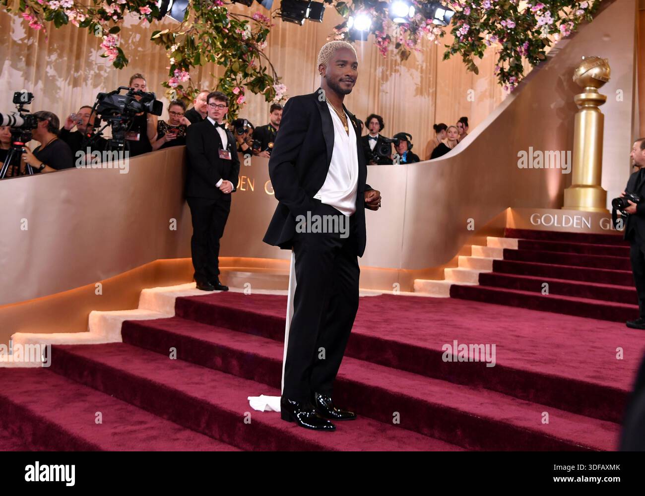 Scott Evans arrives at the 83rd Golden Globes on Sunday, Jan. 11, 2026 ...