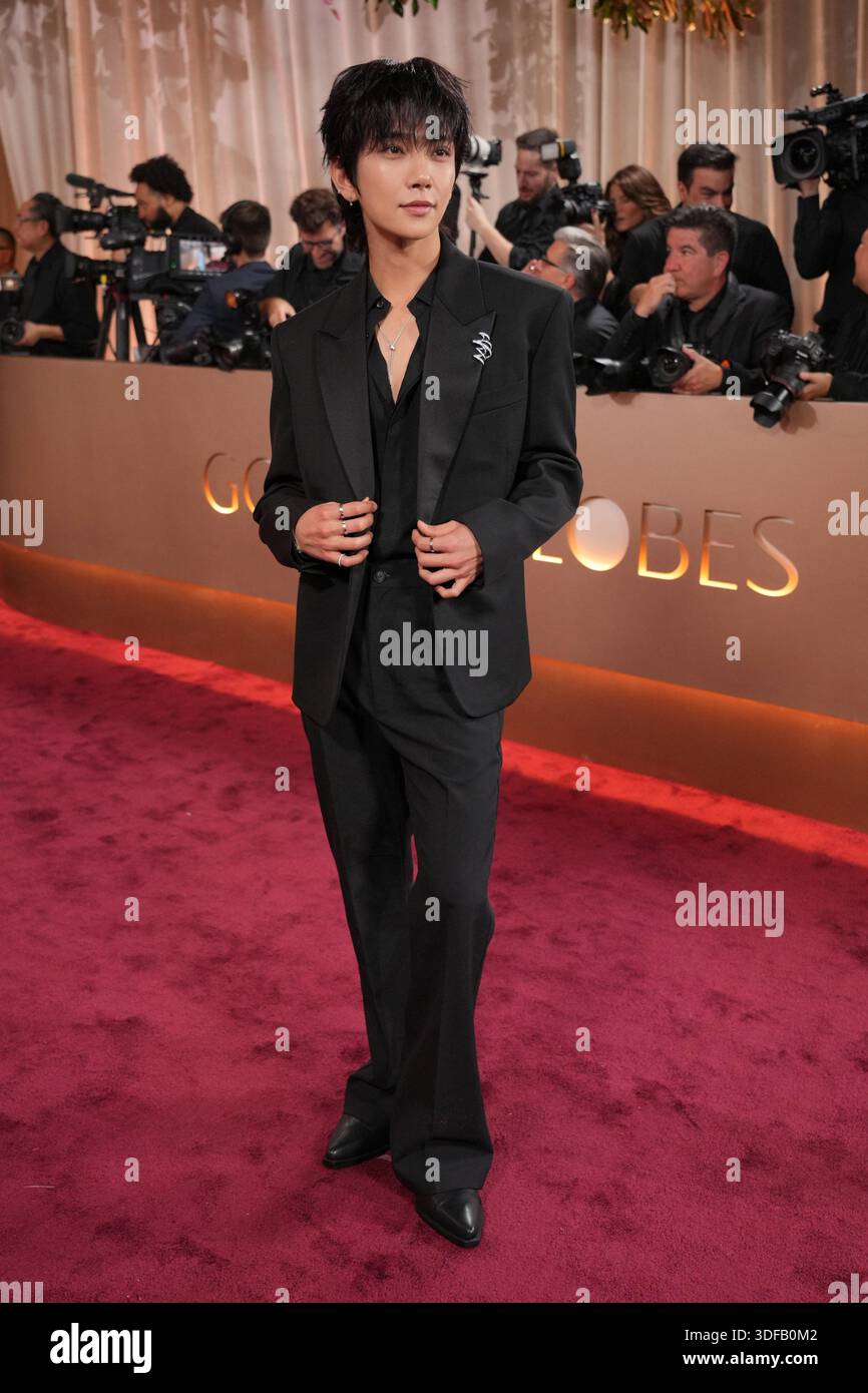 Joshua Hong arrives at the 83rd Golden Globes on Sunday, Jan. 11, 2026 ...