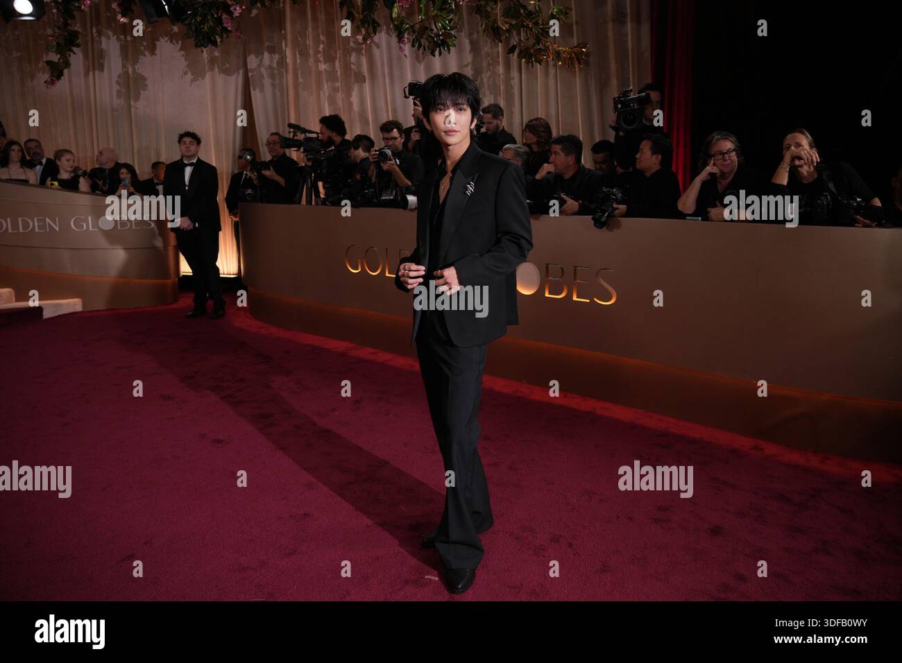 Joshua Hong arrives at the 83rd Golden Globes on Sunday, Jan. 11, 2026 ...