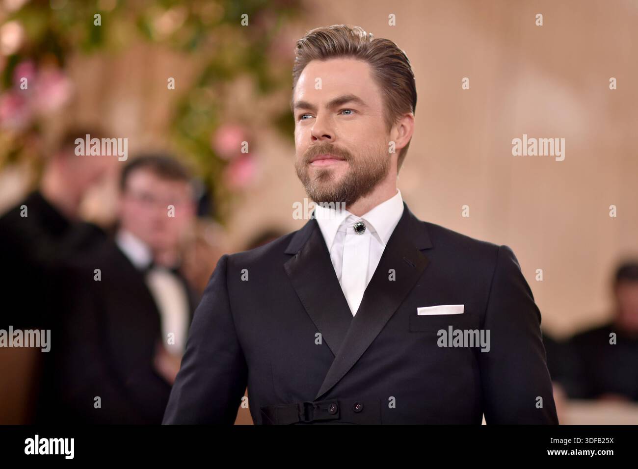 Derek Hough arrives at the 83rd Golden Globes on Sunday, Jan. 11, 2026 ...
