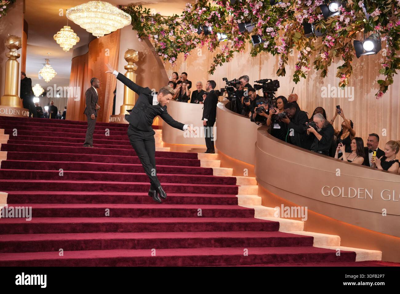 Derek Hough arrives at the 83rd Golden Globes on Sunday, Jan. 11, 2026 ...