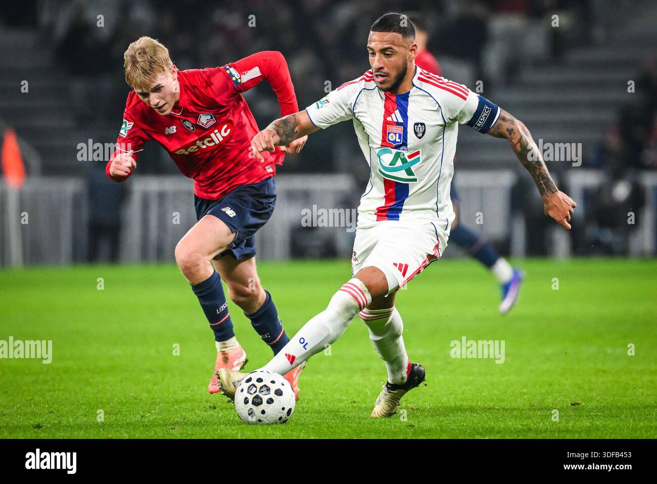 Hakon ARNAR HARALDSSON of Lille and Corentin TOLISSO of Lyon during the ...