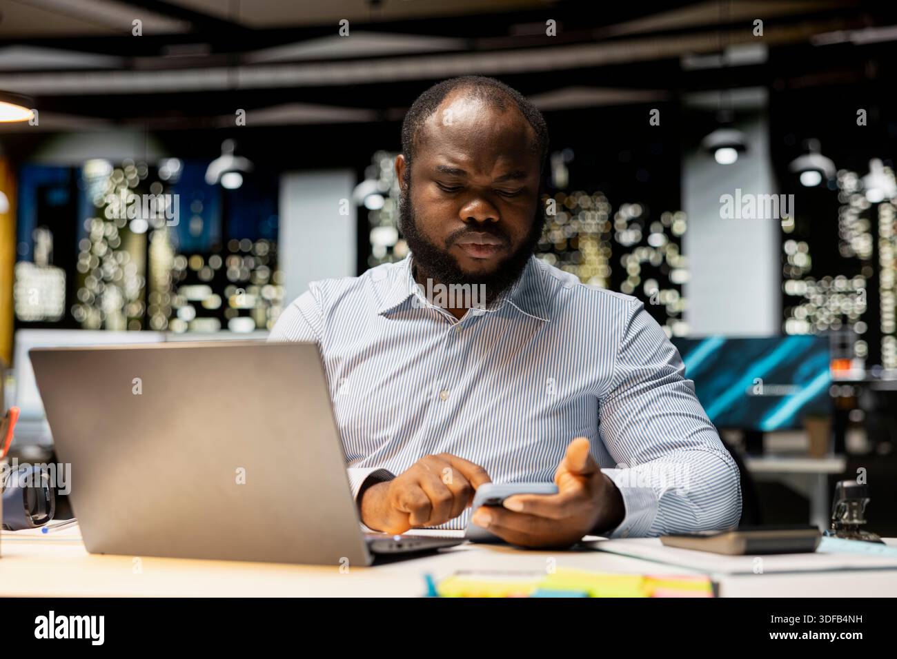 Overworked male worker checking calendar hi-res stock photography and ...