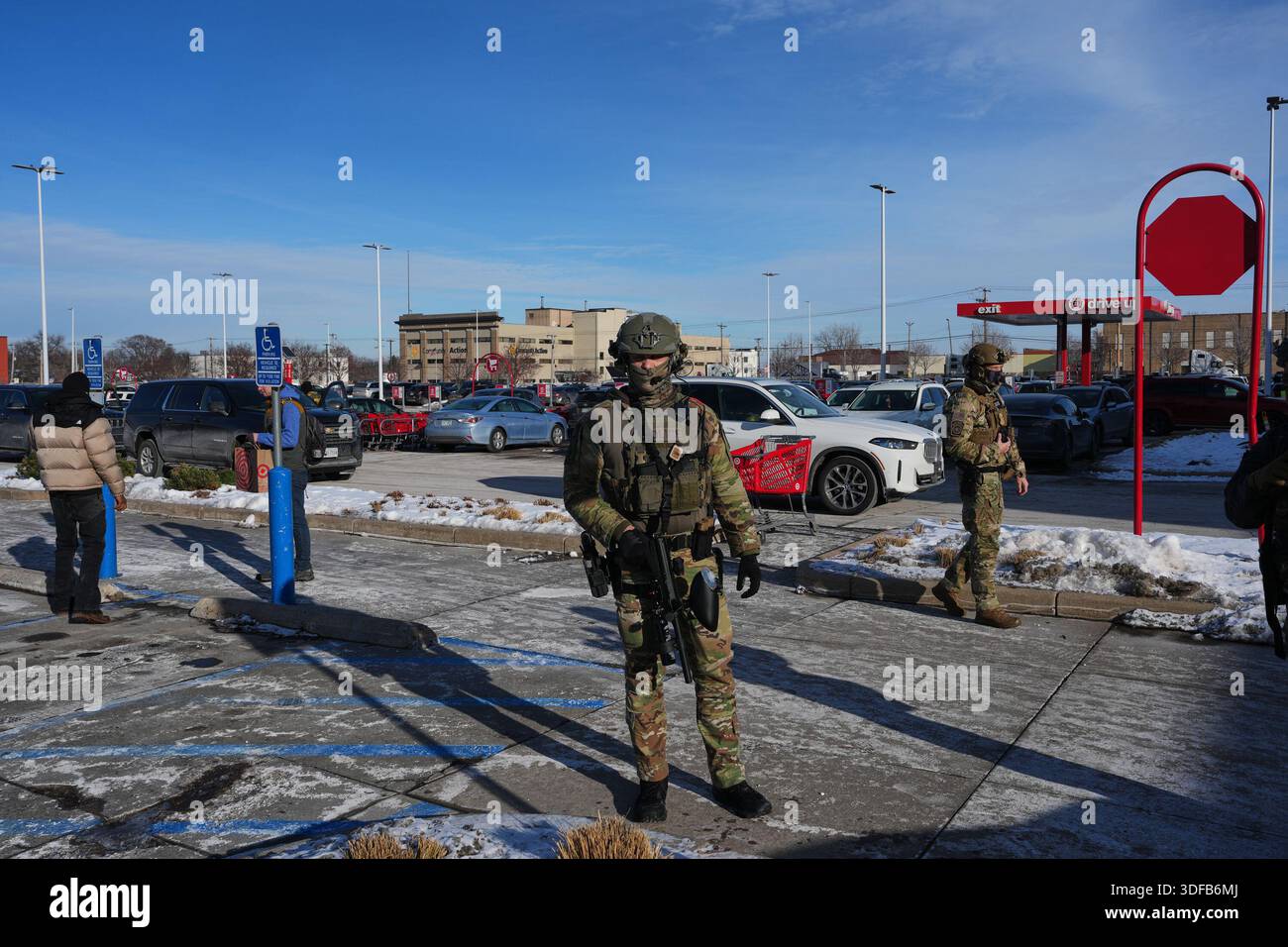 U.S. Customs and Border Protection agents are seen outside of a Target ...