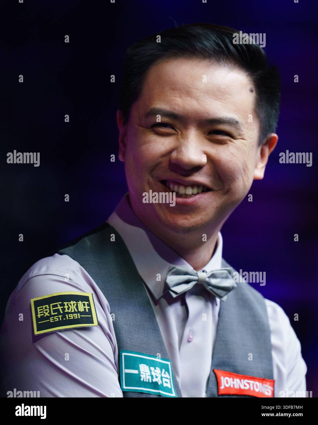 Xiao Guodong smiling during the round one match between Xiao Guodong ...