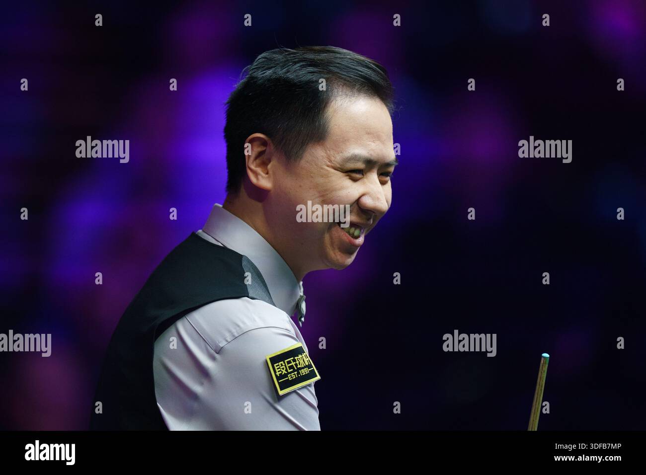 Xiao Guodong smiling during the round one match between Xiao Guodong ...