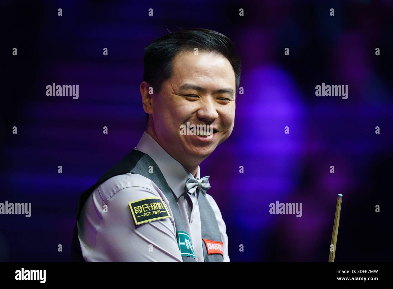 Xiao Guodong smiling during the round one match between Xiao Guodong ...