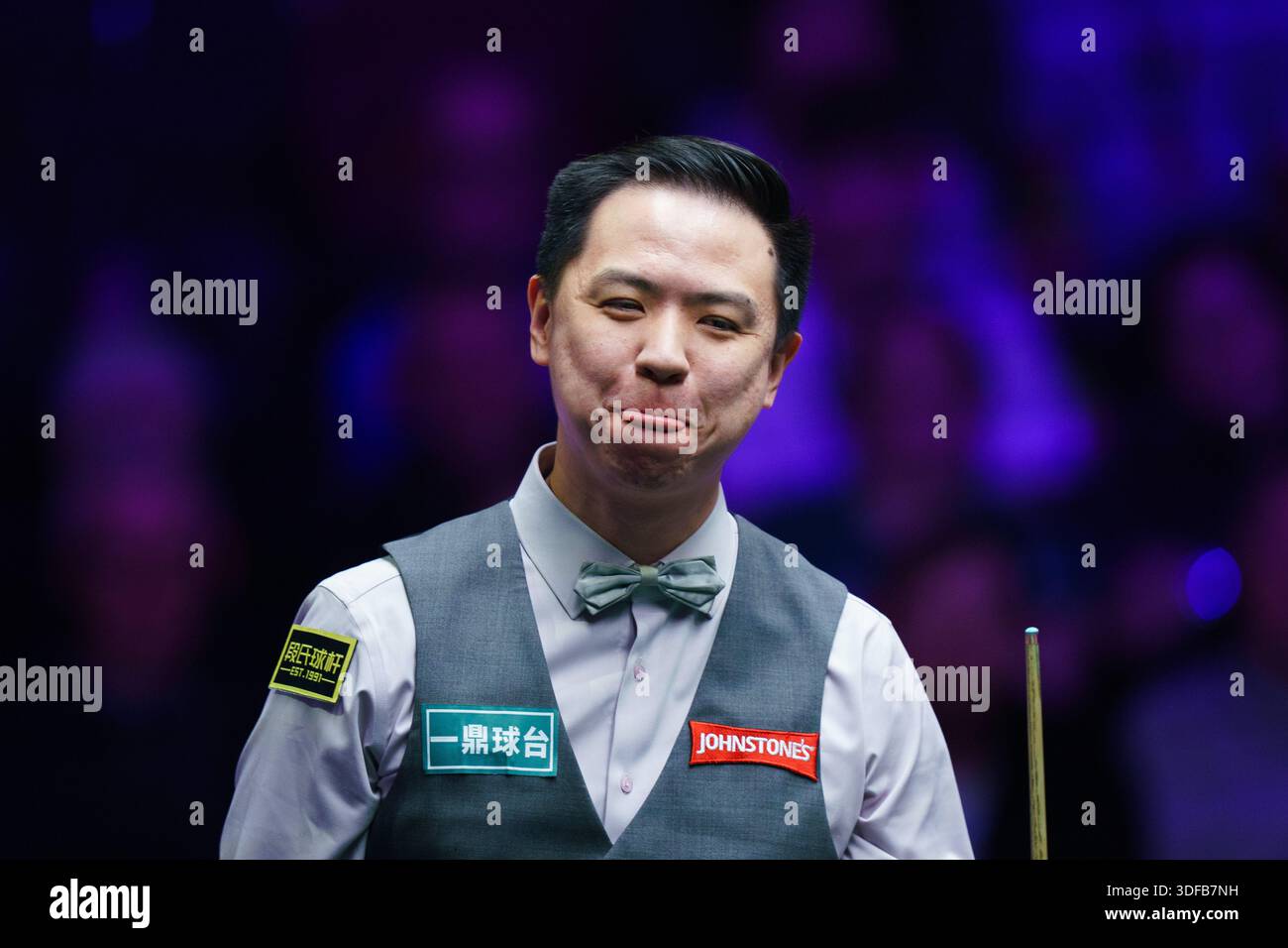 Xiao Guodong smiling during the round one match between Xiao Guodong ...