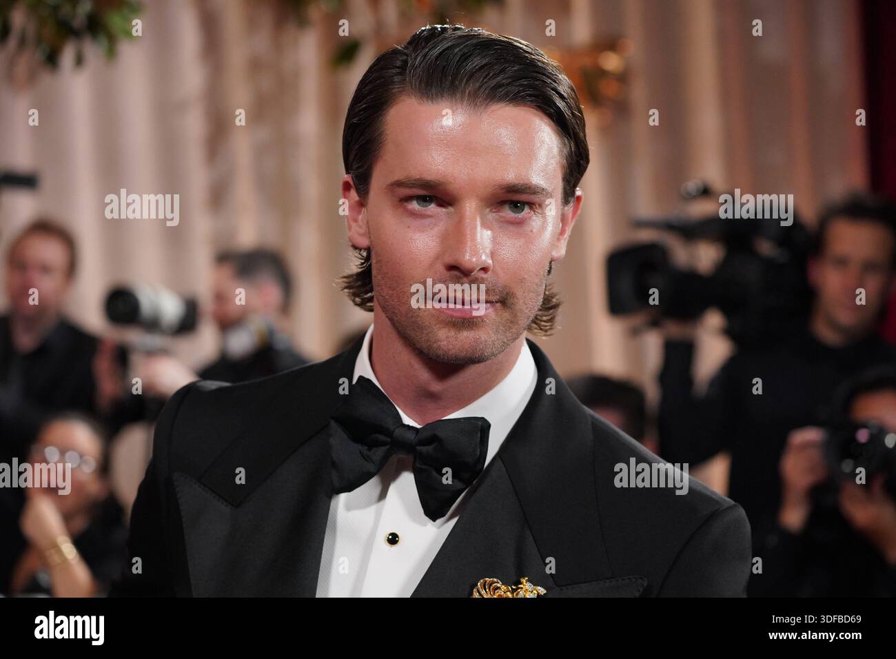 Patrick Schwarzenegger arrives at the 83rd Golden Globes on Sunday, Jan ...