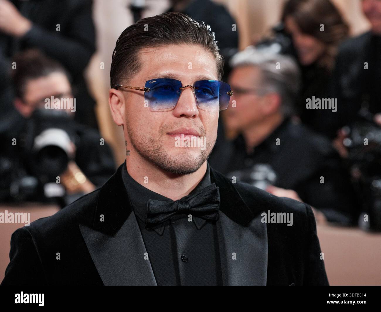 Brian Ortega walking on the red carpet at The 83rd Annual Golden Globe ...