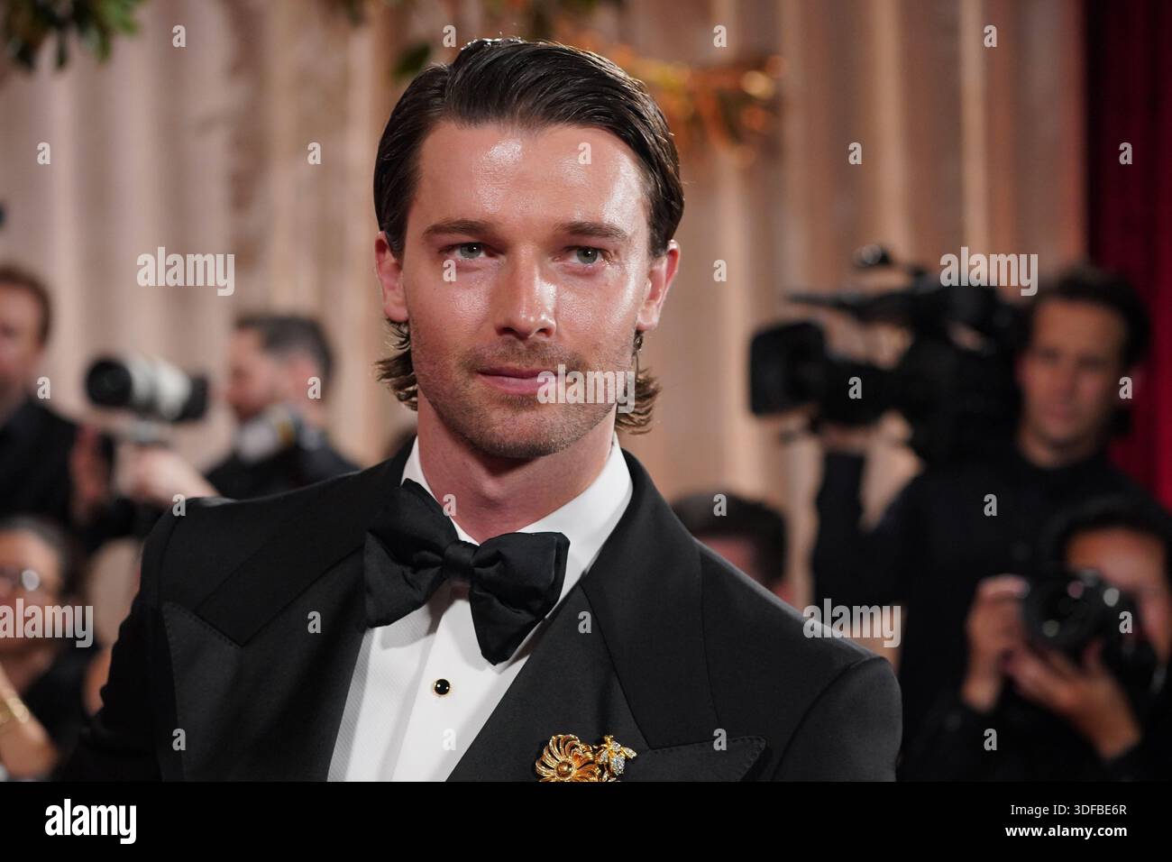 Patrick Schwarzenegger arrives at the 83rd Golden Globes on Sunday, Jan ...