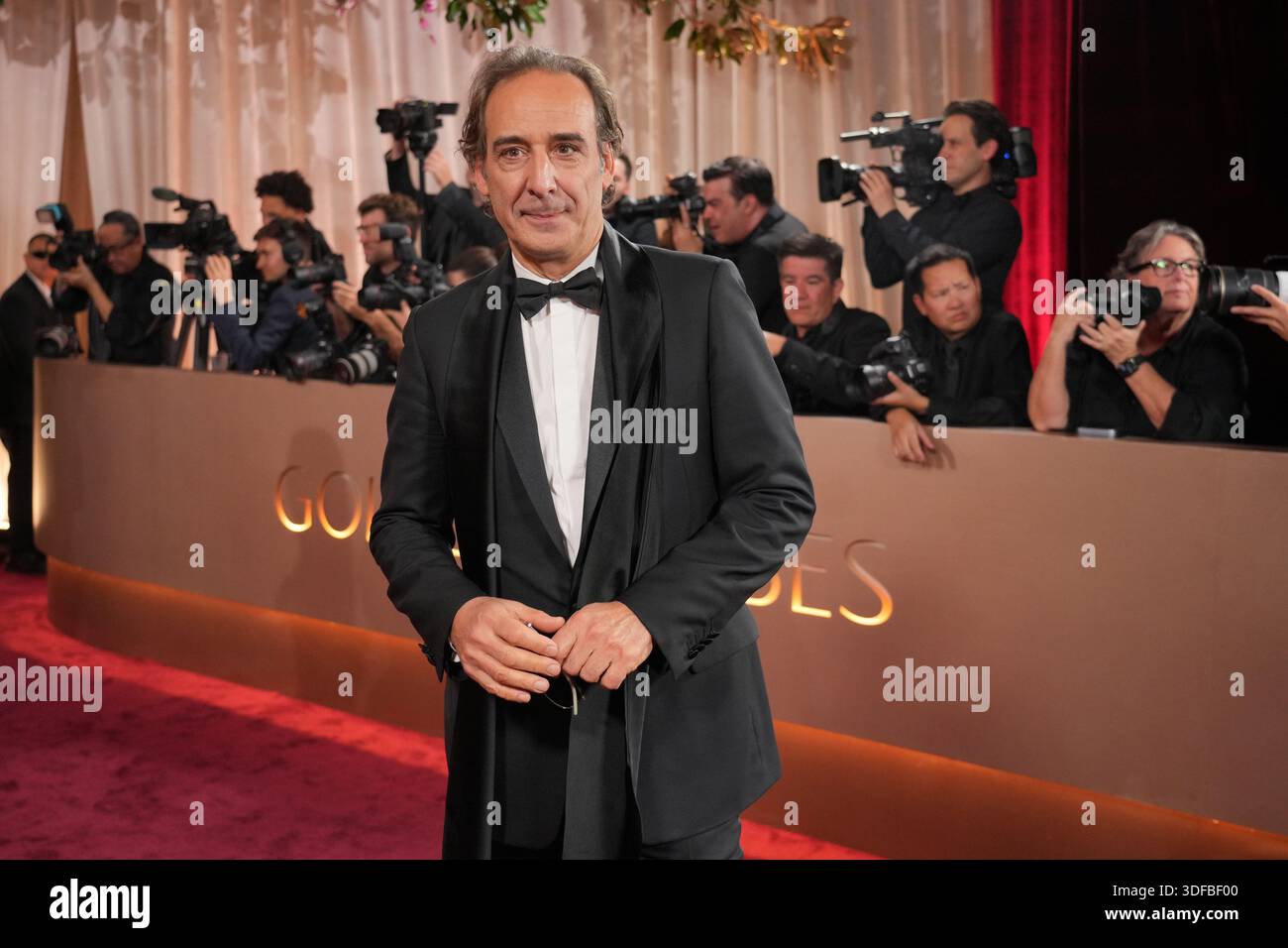 Alexandre Desplat arrives at the 83rd Golden Globes on Sunday, Jan. 11 ...