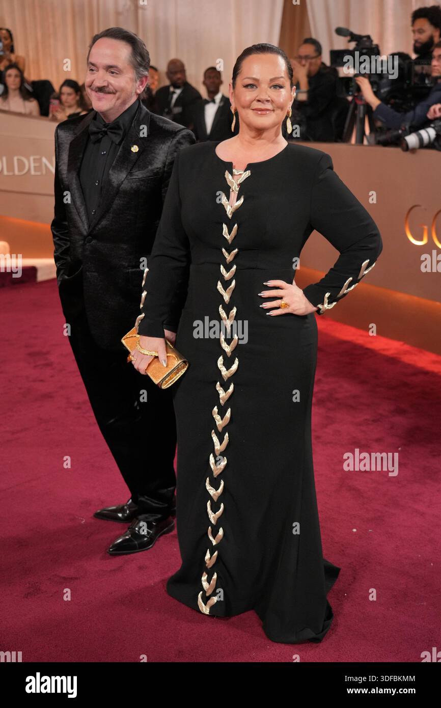 Ben Falcone, left, and Melissa McCarthy arrive at the 83rd Golden ...