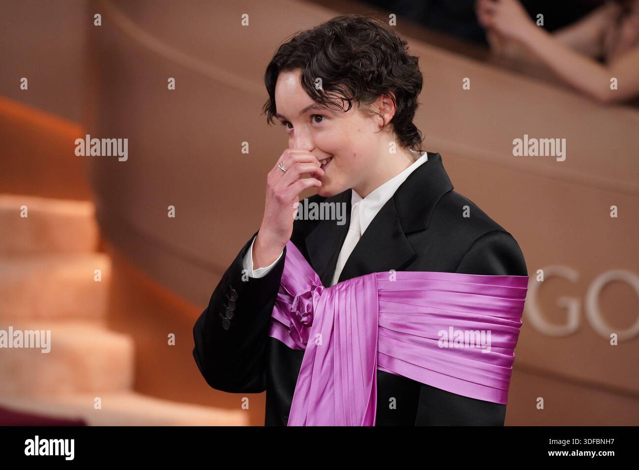 Bella Ramsey arrives at the 83rd Golden Globes on Sunday, Jan. 11, 2026 ...