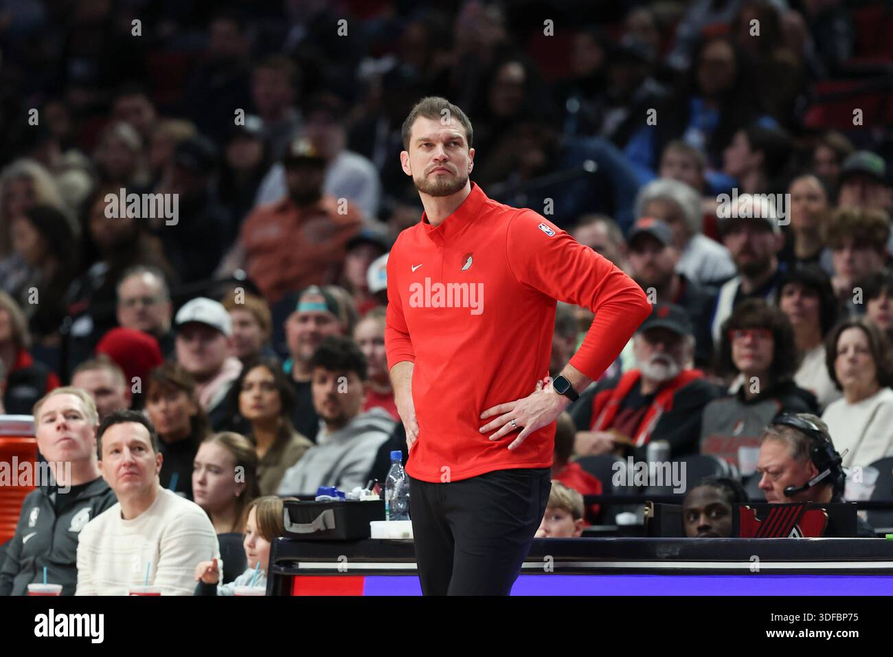Portland Trail Blazers acting head coach Tiago Splitter, center, looks ...