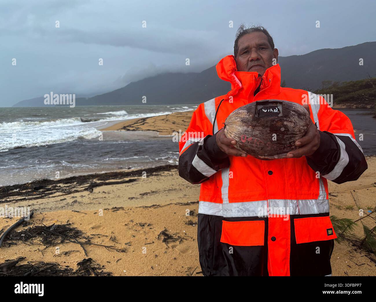 Senior Ranger Ashley with recovered ocean drifter, Gunggandjyi Land and ...