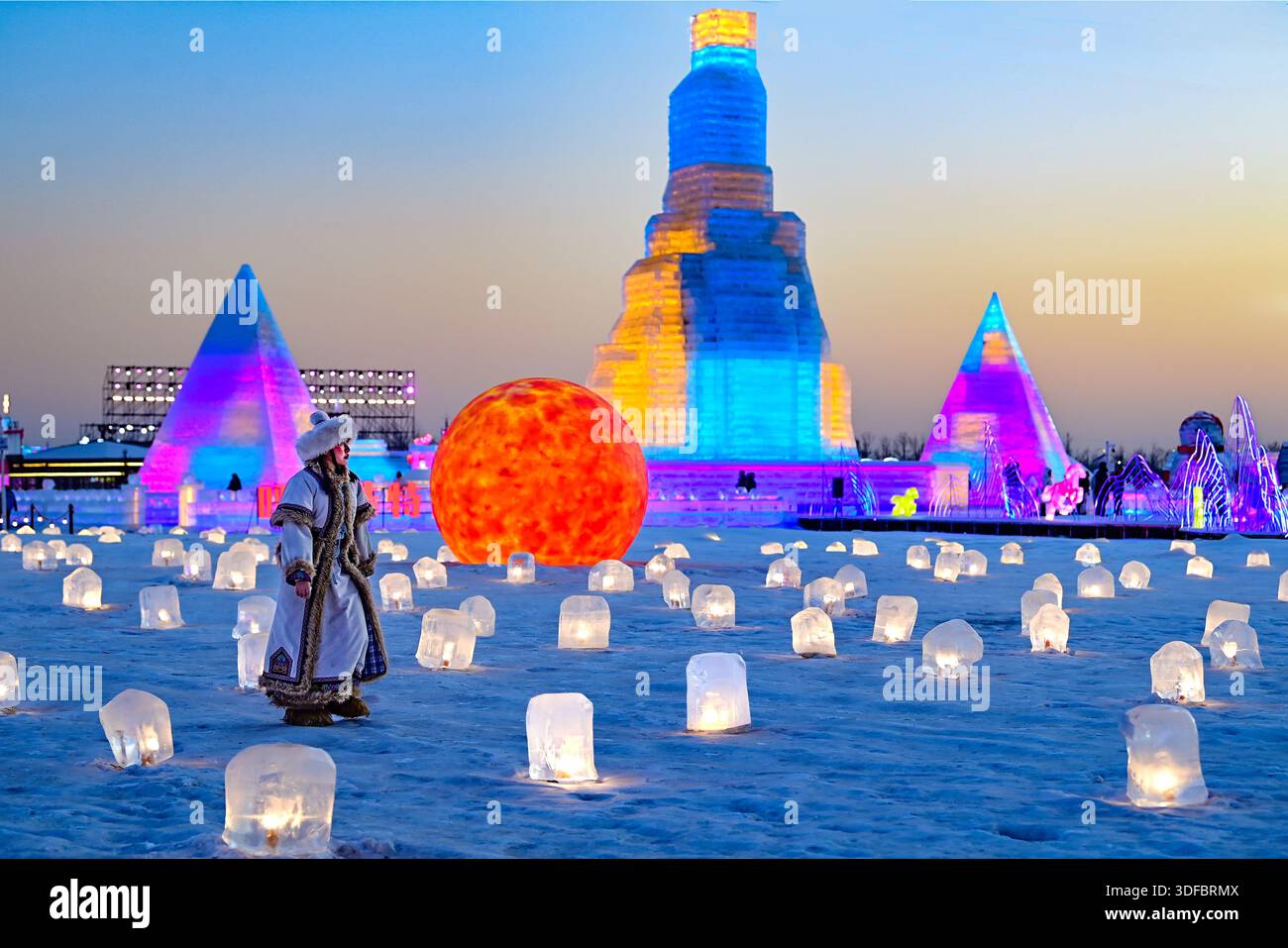 HOHHOT, CHINA - JANUARY 11, 2026 - Tourists play in an ice and snow ...