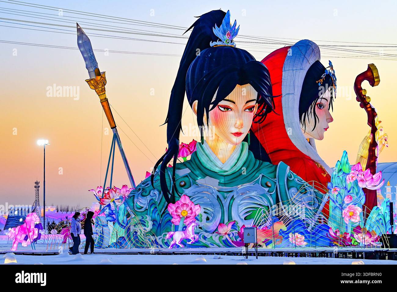 HOHHOT, CHINA - JANUARY 11, 2026 - Tourists play in an ice and snow ...