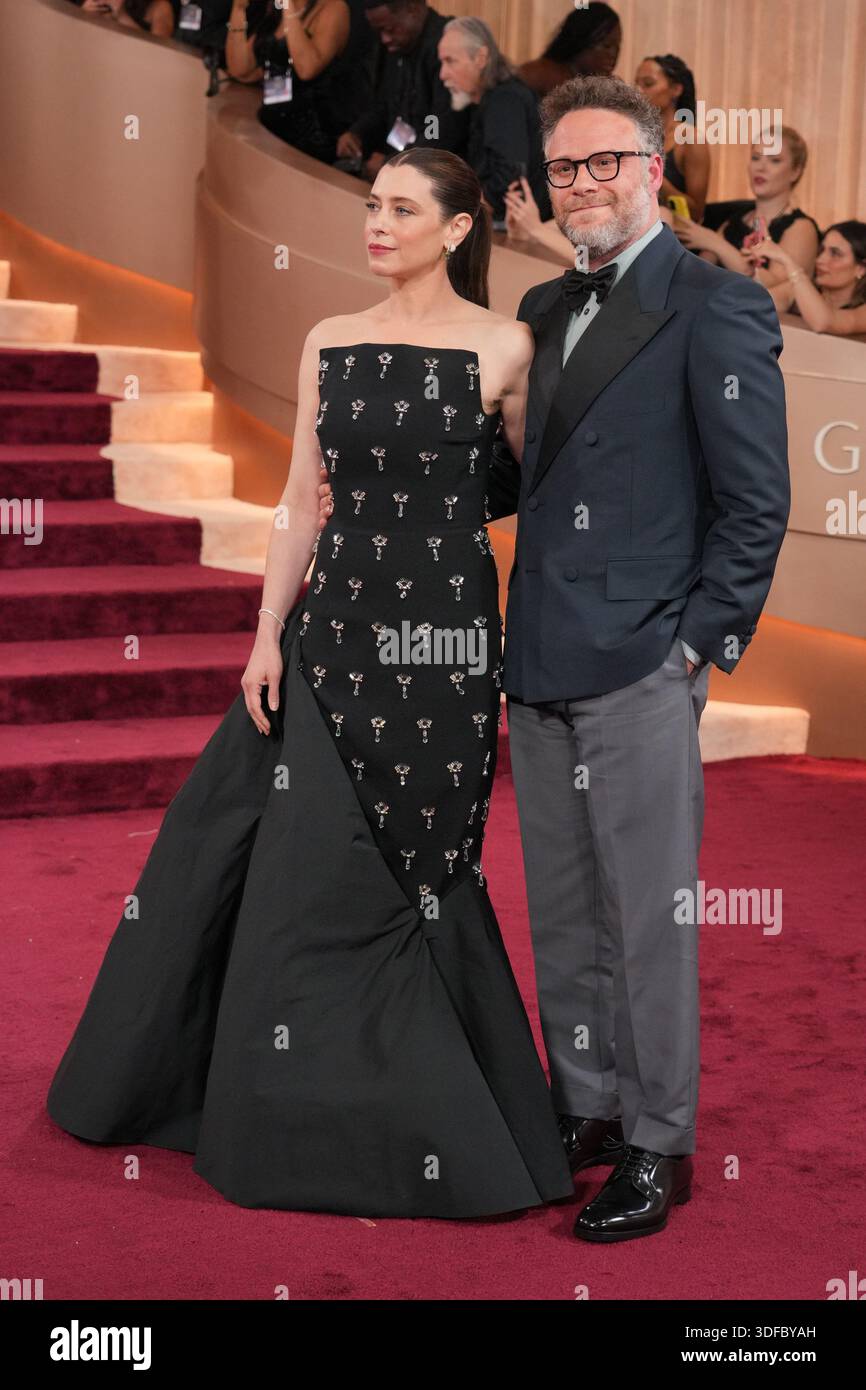 Lauren Miller, left, and Seth Rogen arrive at the 83rd Golden Globes on ...