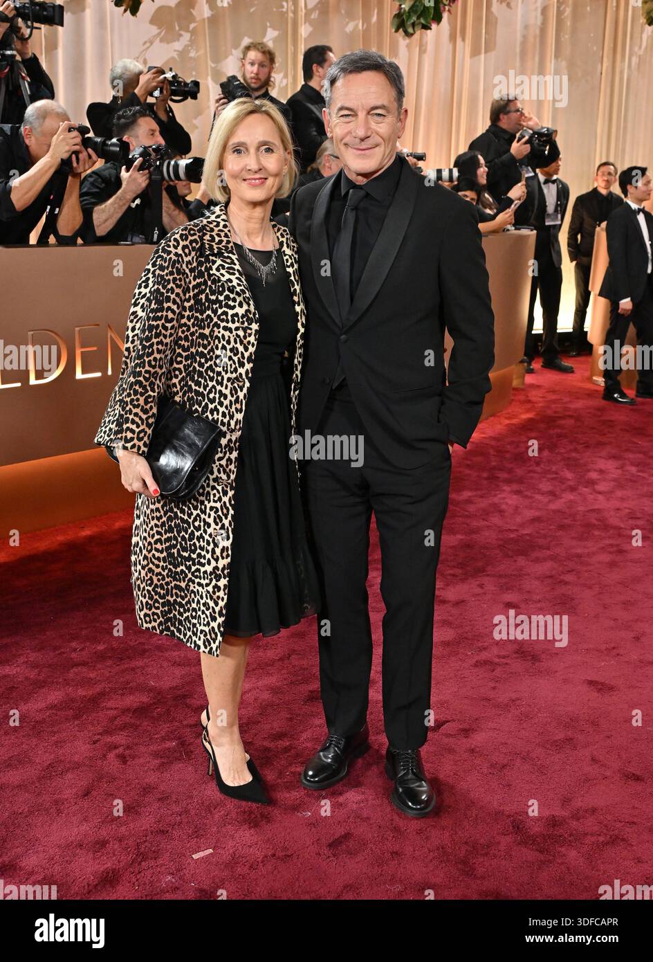 Beverly Hills, USA. 11th Jan, 2026. Emma Hewitt and Jason Isaacs ...