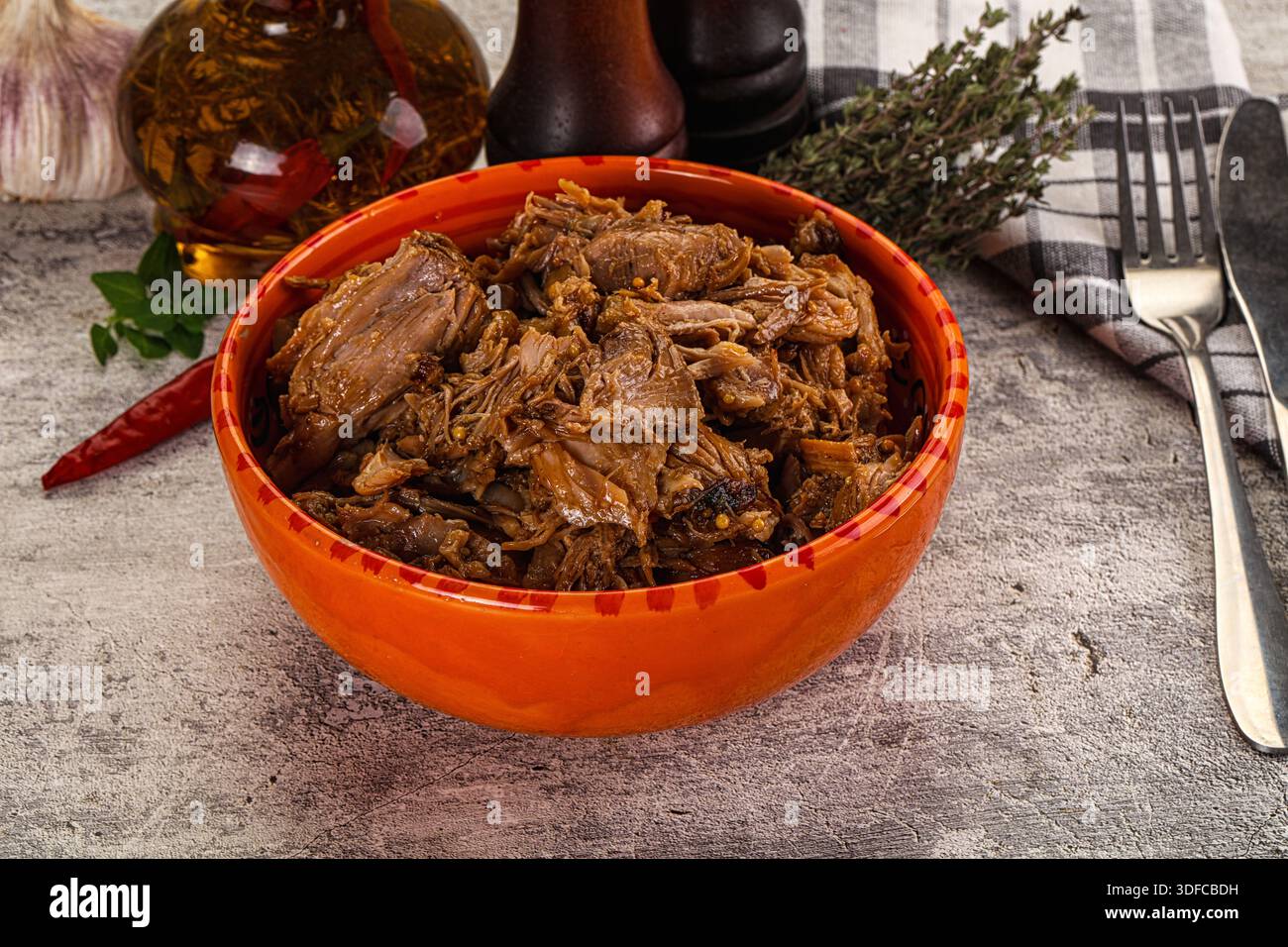Shredded slow cooked pork meat in the bowk Stock Photo - Alamy
